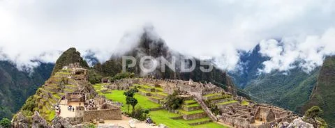 Machu Picchu, panoramic view of peruvian incan town ~ Hi Res #144580253
