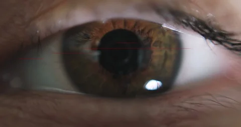 Macro eye. Red laser scanner. | Stock Video | Pond5