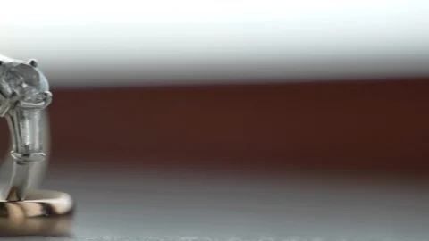 Macro pan right to left to reveal engage... | Stock Video | Pond5