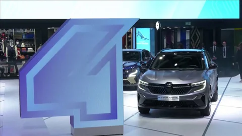 Macron visits Paris auto show, Stellanti... | Stock Video | Pond5