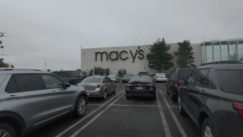 Macy's sign next to car park outside Qua... | Stock Video | Pond5