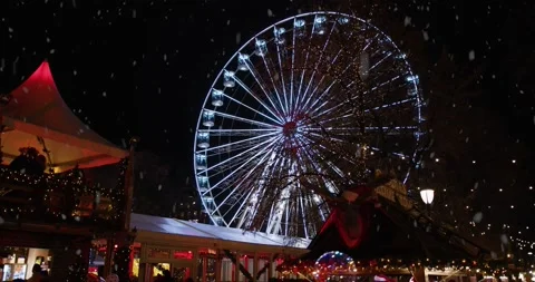 Magical Christmas market and Ferry wheel... | Stock Video | Pond5