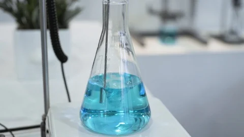 Magnetic laboratory agitators. | Stock Video | Pond5