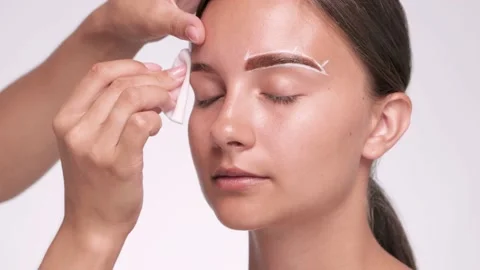 Make-up artist makes markings and dyes e... | Stock Video | Pond5