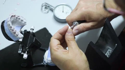 Making a dental crown. laboratory. close... | Stock Video | Pond5
