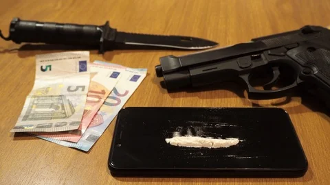 Making a line of coke with a knife. Ille... | Stock Video | Pond5