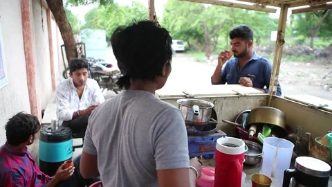 making special masala tea on the roadsid... | Stock Video | Pond5