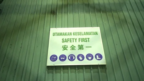 Malaysian safety first sign in a factory... | Stock Video | Pond5