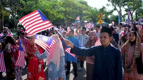 Malaysian wave the flag during Merdeka | Stock Video | Pond5