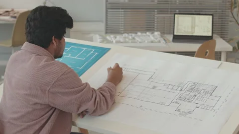 Male Architect Drawing House Plan in Wor... | Stock Video | Pond5