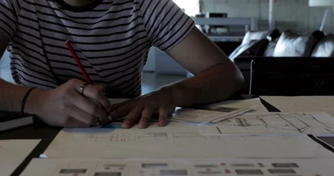 Male architect planning, drafting bluepr... | Stock Video | Pond5