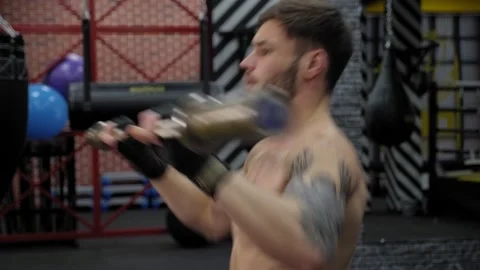 A male bare-chested boxer does a barbell... | Stock Video | Pond5