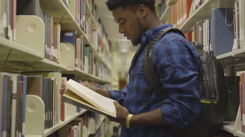 Male College Student Perusing the Conten... | Stock Video | Pond5