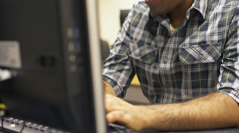 Male at computer in college classroom ty... | Stock Video | Pond5
