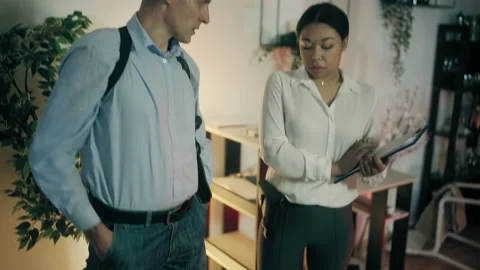 Male detective discussing murder case wi... | Stock Video | Pond5