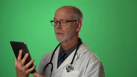 Male doctor wearing a lab coat and steth... | Stock Video | Pond5