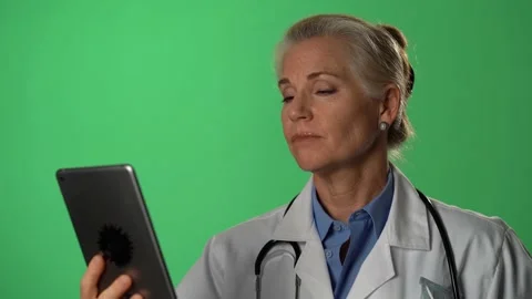 Male doctor wearing a lab coat and steth... | Stock Video | Pond5