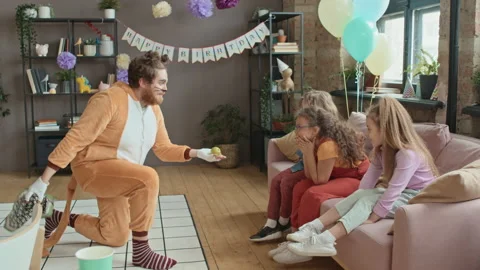 Male Entertainer Showing Party Tricks to... | Stock Video | Pond5