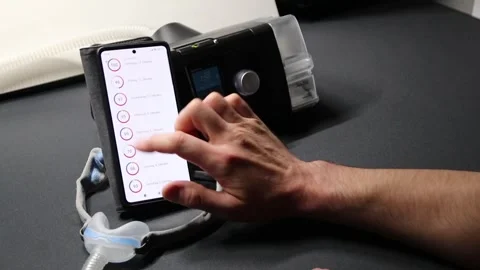 Male European with cpap machine checking... | Stock Video | Pond5