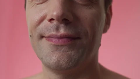 Male Face with Real Skin Texture on Pink... | Stock Video | Pond5