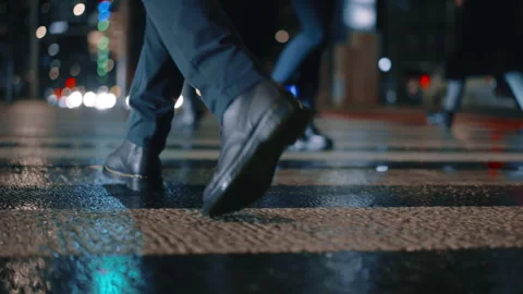 Male feet steps crossing busy street at ... | Stock Video | Pond5