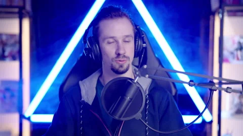 Male gaming streamer interacting with th... | Stock Video | Pond5