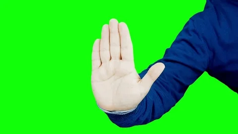 Male hand gesturing halt or stop sign is... | Stock Video | Pond5