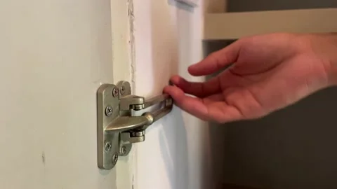 Male hand locking metal hasp latch locke... | Stock Video | Pond5