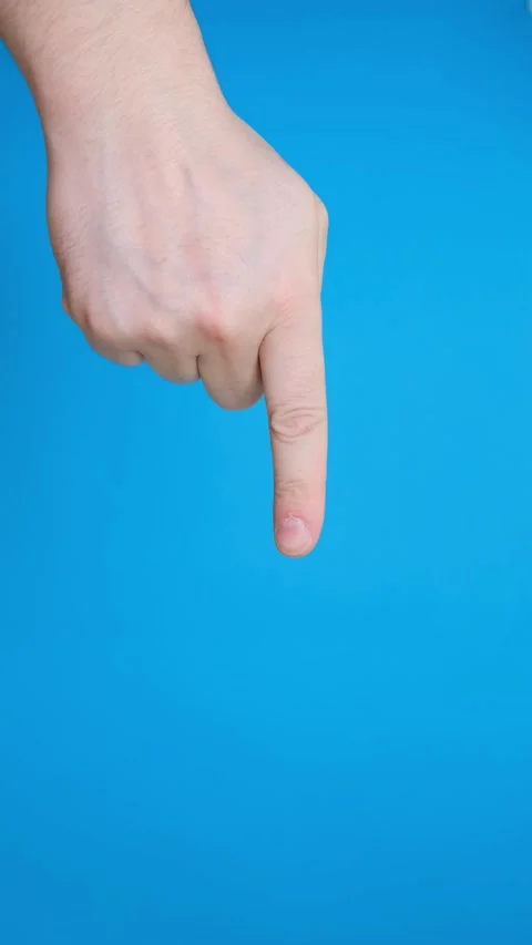 Male hand pointing a finger to the side,... | Stock Video | Pond5