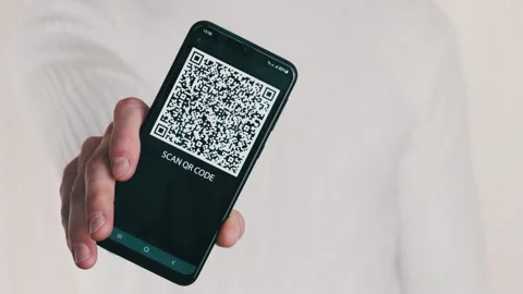 Male Hand Shows QR Code on Smartphone on... | Stock Video | Pond5