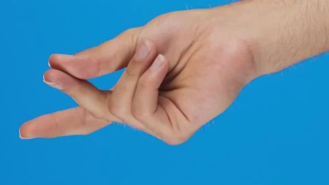 Male hand with snapping fingers on blue ... | Stock Video | Pond5