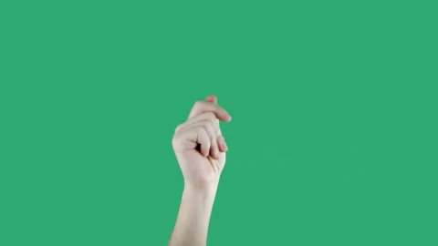 Male hand with snapping fingers on green... | Stock Video | Pond5