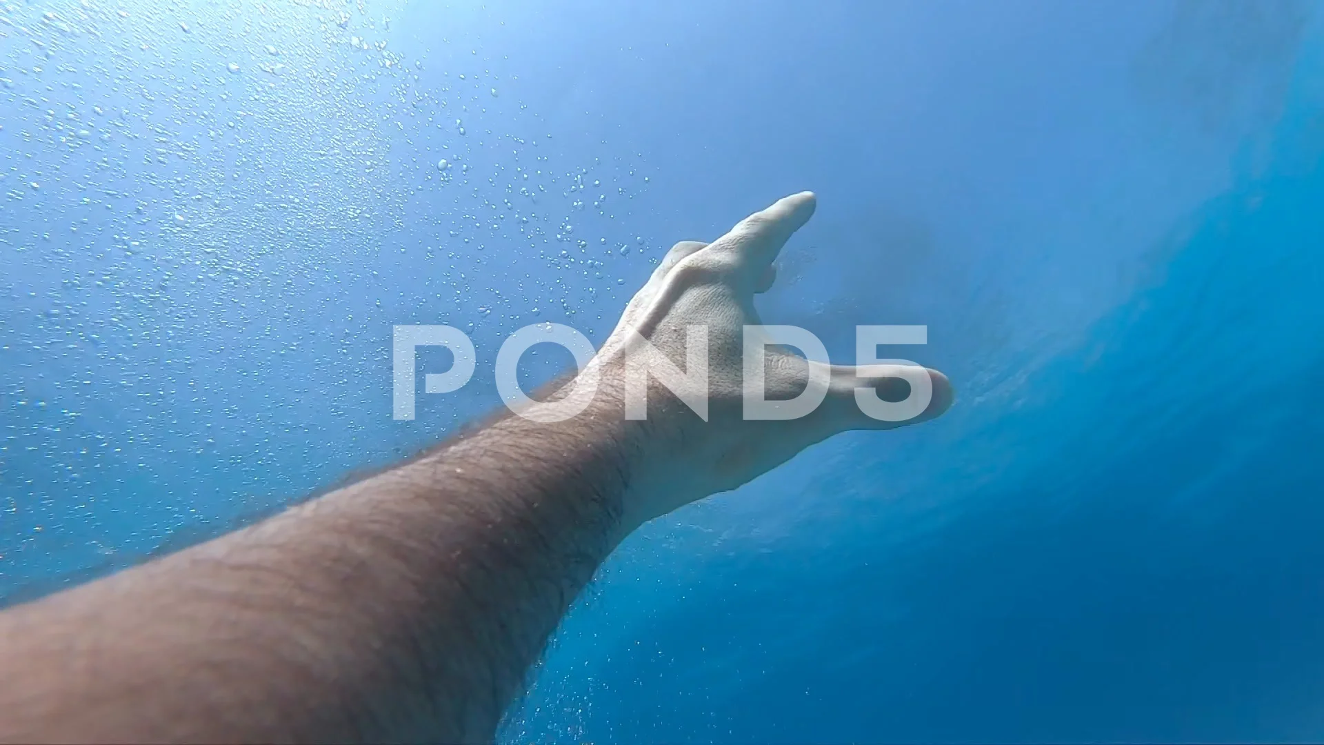 Hand Reaching Out Of Water