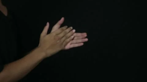 Male hands clapping against a black back... | Stock Video | Pond5