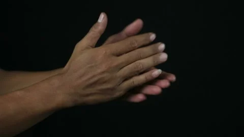 Male hands clapping against a black back... | Stock Video | Pond5