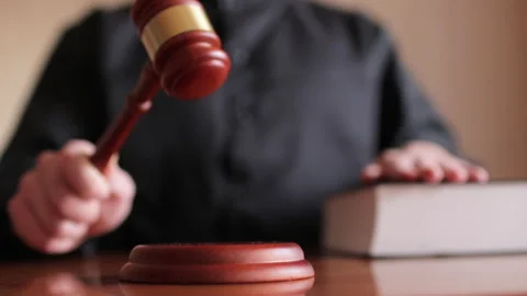 Male Judge hitting the gavel in a Court.... | Stock Video | Pond5