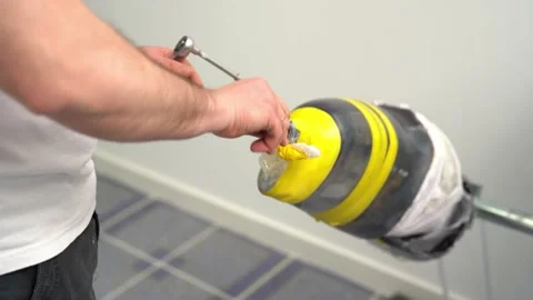 Male master unscrewing screw from prosth... | Stock Video | Pond5
