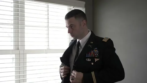 Male military officer putting on formal ... | Stock Video | Pond5