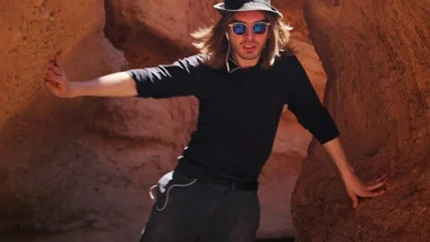 Male model dancer in a wild dance in nat... | Stock Video | Pond5