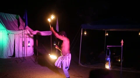 Male Model Dancing And Juggling Fire At ... | Stock Video | Pond5