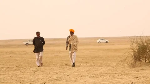 Male model with getup in Desert | Stock Video | Pond5