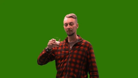 Male model on green screen drinking milk... | Stock Video | Pond5