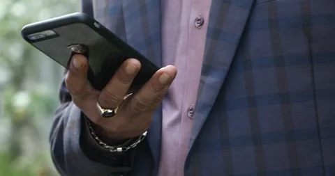 Male Model hands with cell phone | Stock Video | Pond5