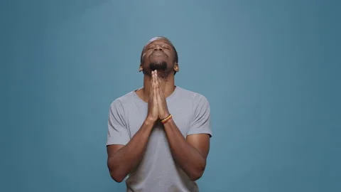 Male model holding hands in prayer to do... | Stock Video | Pond5