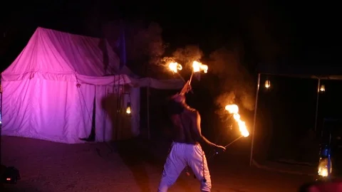 Male Model Spewing Fire And Dancing At N... | Stock Video | Pond5