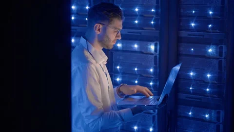 Male network engineer doing a system che... | Stock Video | Pond5