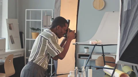 Male Photographer Doing Still Life Photo... | Stock Video | Pond5