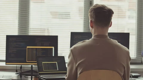 Male Programmer Coding on Computer at Wo... | Stock Video | Pond5