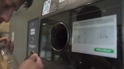 Male returns plastic bottles, reusable c... | Stock Video | Pond5