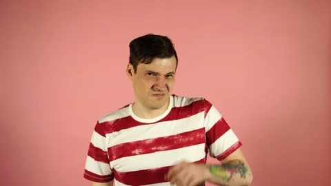 The male scratching his eyes, face close... | Stock Video | Pond5